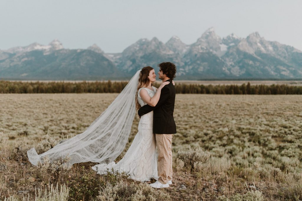 Samantha and Caleb's Elopement With a Pup in the Tetons - Brides ...